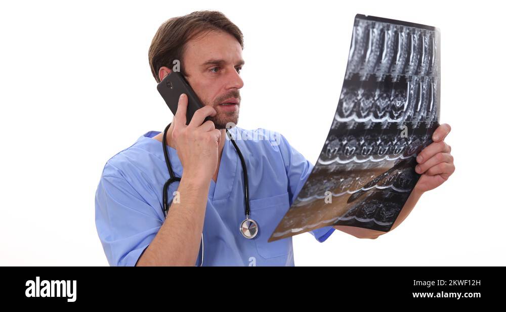 Medical Doctor Man Check Mri Tomography Bad News Talking Mobile Phone ...