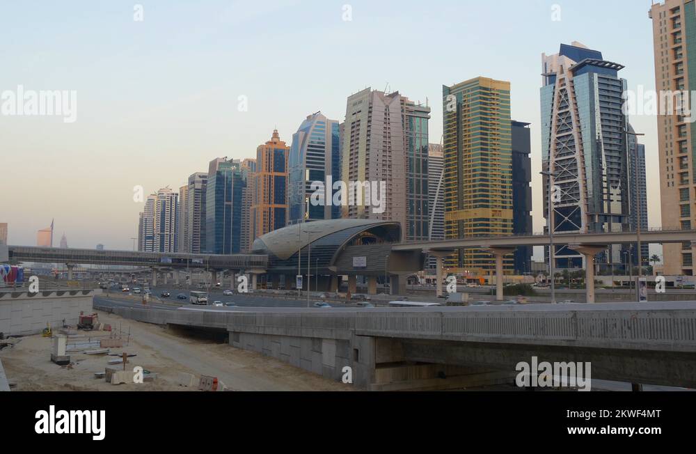dubai sunset jlt sheikh zayed traffic road metro line panorama 4k uae ...