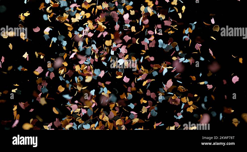 Confettis Falling against Black Background, Slow Motion 4K Stock Video ...
