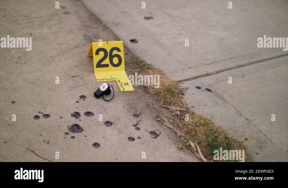 CRIME SCENE WITH BLOOD SURROUNDING A BLUETOOTH DEVICE. A SERIES Stock ...