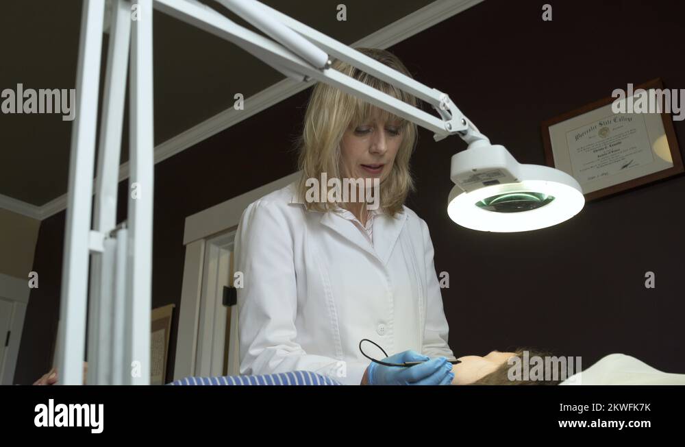 Doctor treating a patient Stock Videos & Footage - HD and 4K Video ...