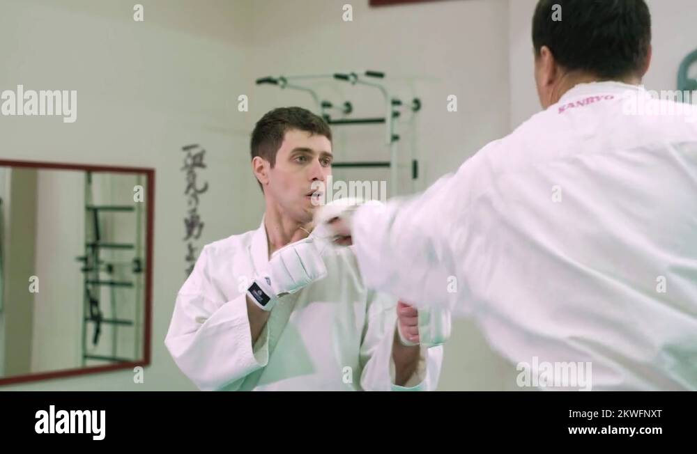 kTwo karate players compete in the ring 4k Stock Video Footage - Alamy