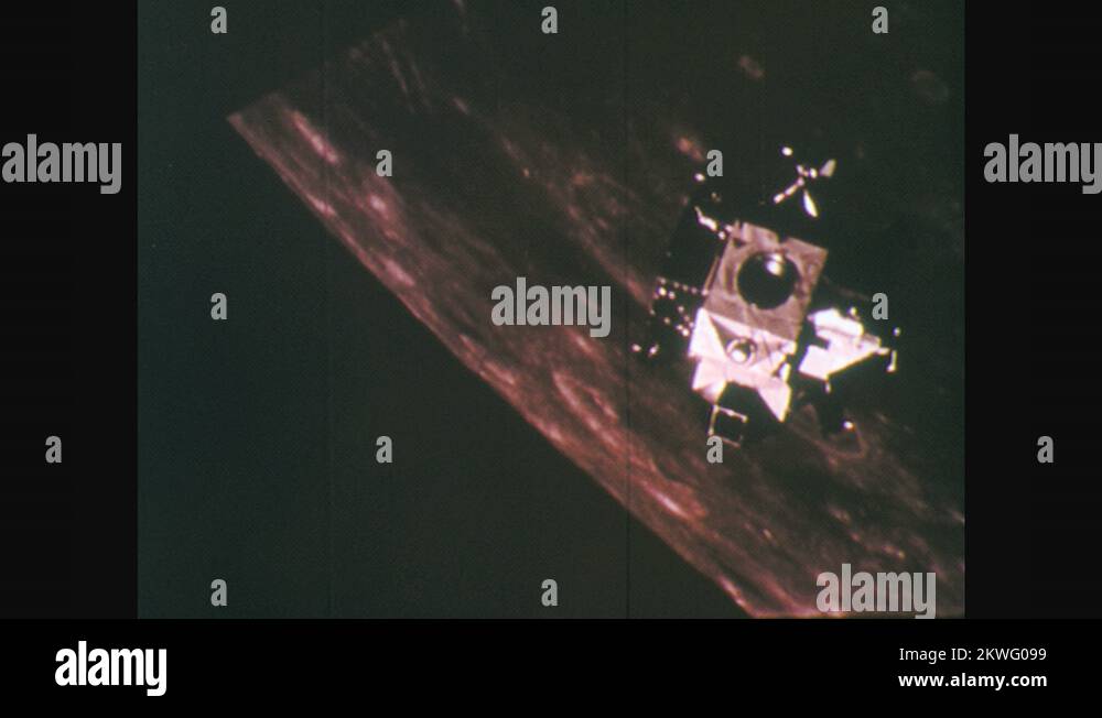 1960s: UNITED STATES: Space module flies above moon. Capsule rotates ...