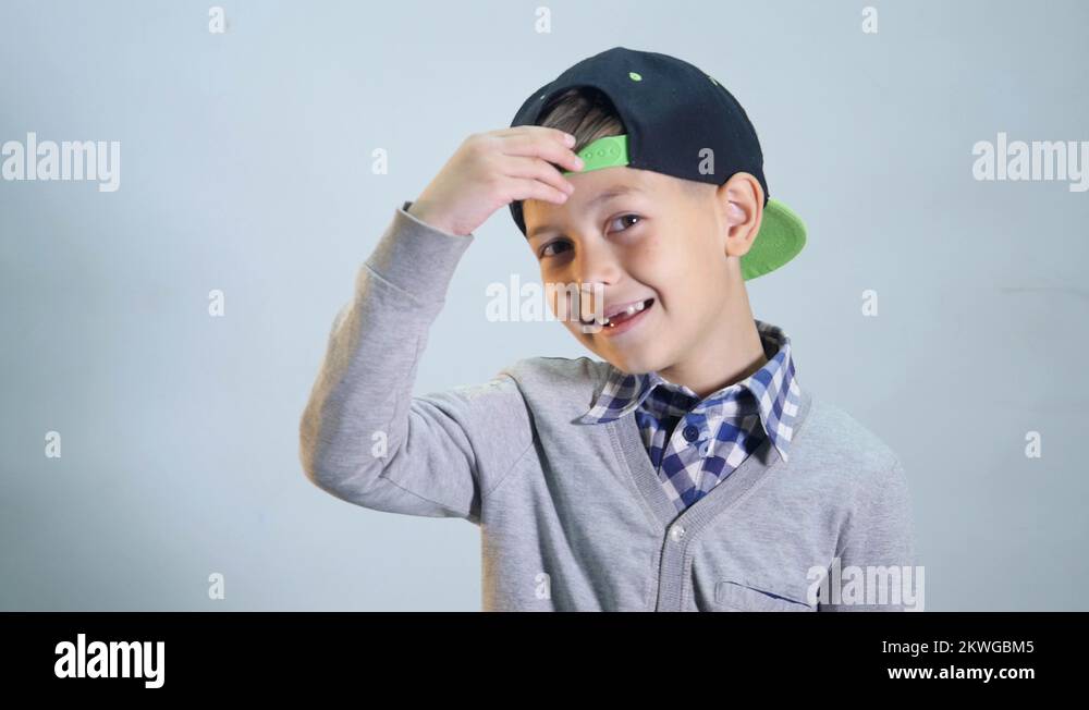 Kid with a cap Stock Videos & Footage - HD and 4K Video Clips - Alamy