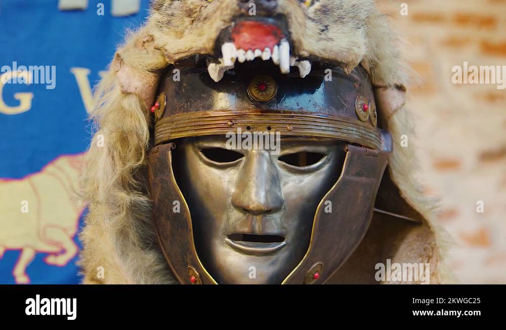 Metal helmet topped by a fox skin. War mask used in Ancient Rome Stock ...