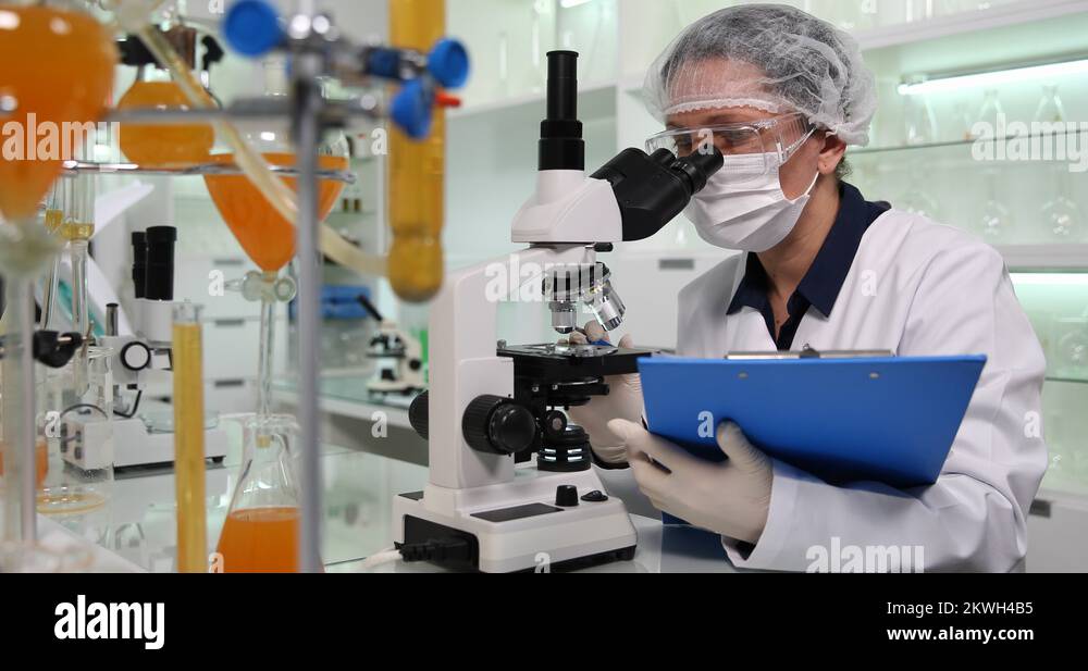 Chemistry Lab, Scientist Woman Working Studying Microscope Medical ...