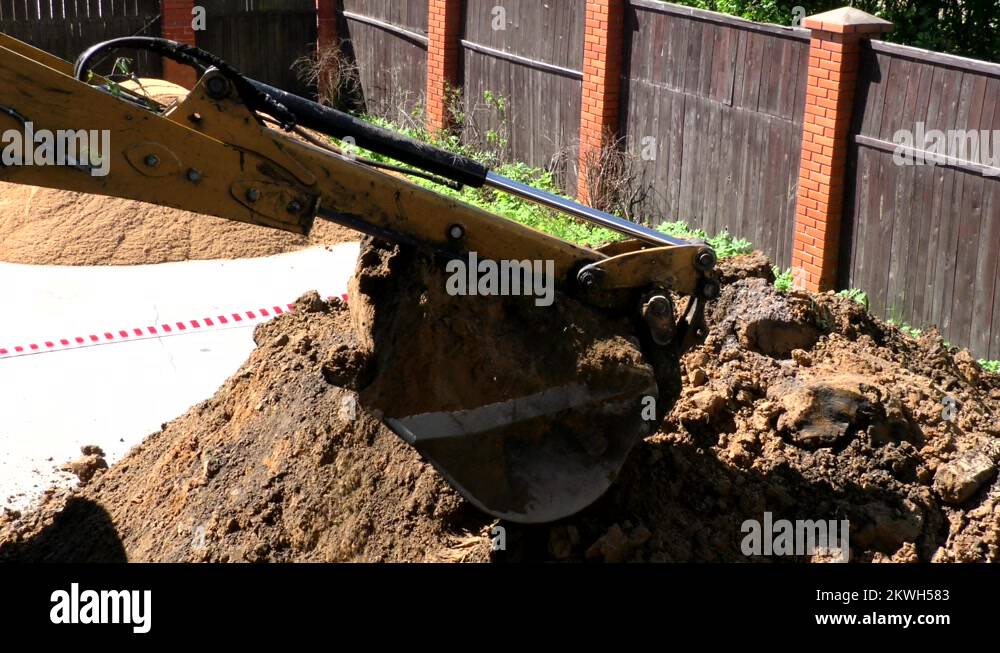 Tractor digging a hole Stock Videos & Footage - HD and 4K Video Clips ...