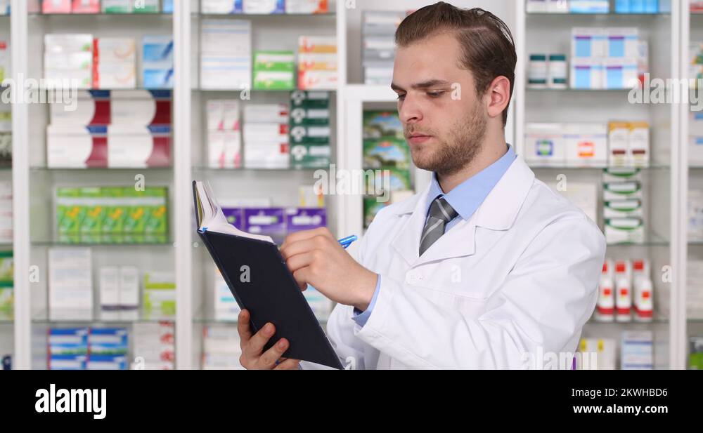 Pharmacist Man Hand Writing Agenda Noting Important Medicine Pharmacy ...