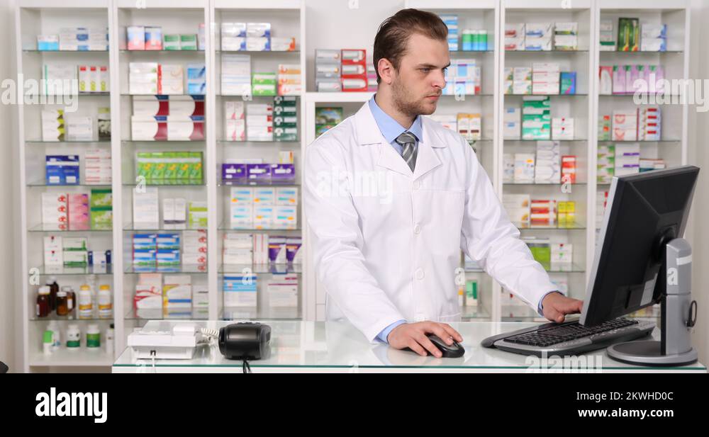 Upset Pharmacist Man Talking Mobile Phone Angry Response Using Computer ...