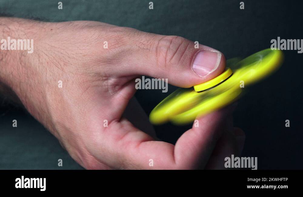 Man playing fidget spinner Stock Videos & Footage - HD and 4K Video ...