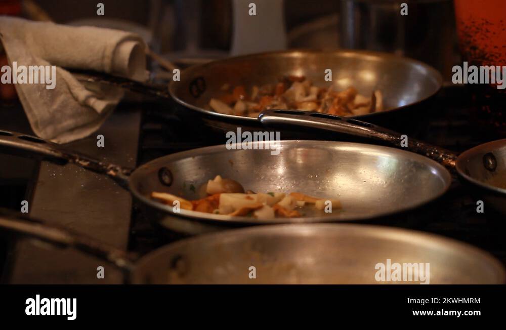 Food Chef cooking Fried fish fillet covered in batter herbs spices ...