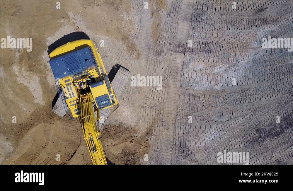 Hydraulic Excavator Digging Bird's Eye View Stock Video Footage - Alamy