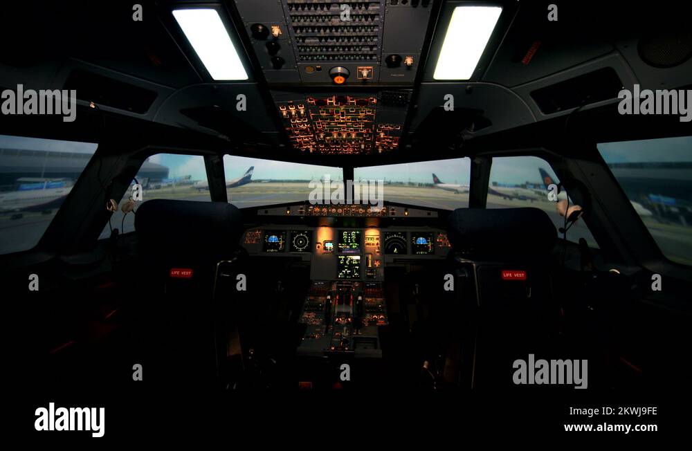 Empty workplace of aircraft pilots. Cockpit or flight deck of a modern ...