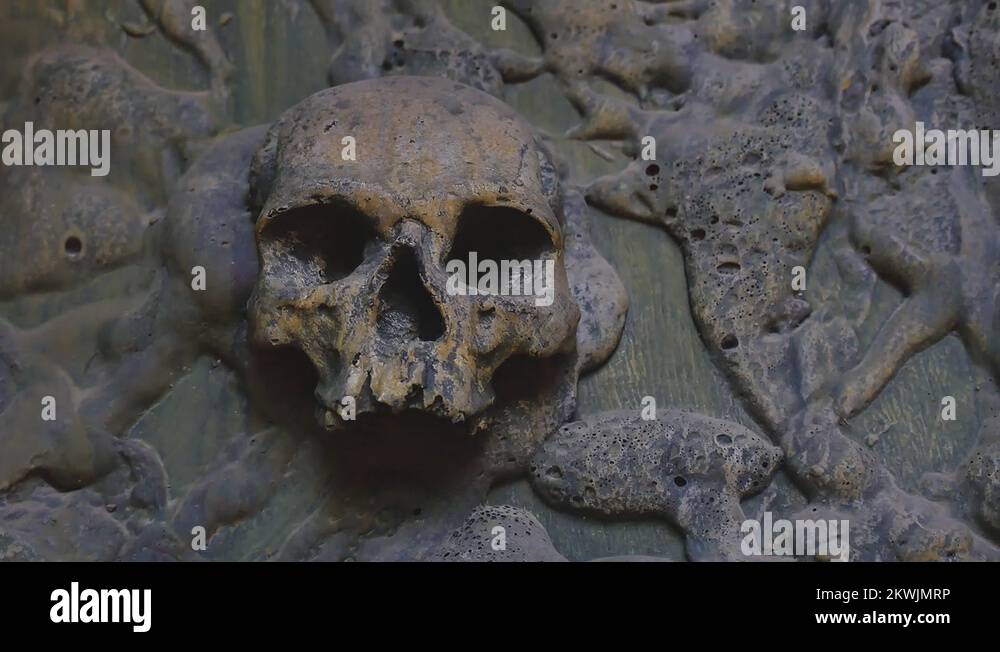 Still life Cannibal Cave photography with six of human skulls and bones ...