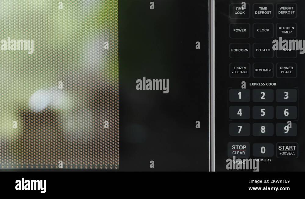 Microwave machine Stock Videos & Footage - HD and 4K Video Clips - Alamy