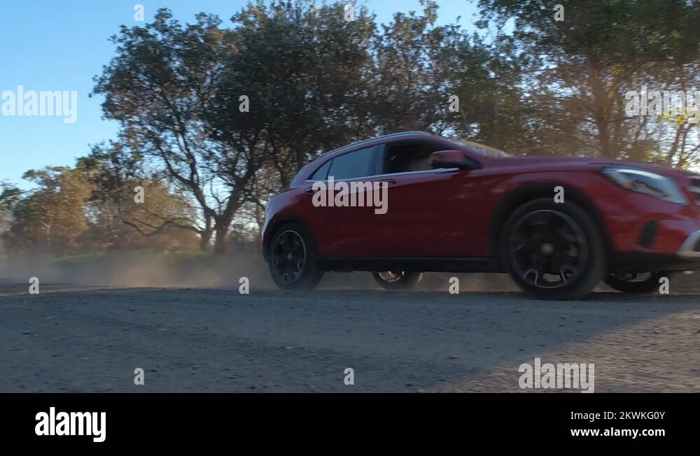 Red car sunset Stock Videos & Footage - HD and 4K Video Clips - Alamy