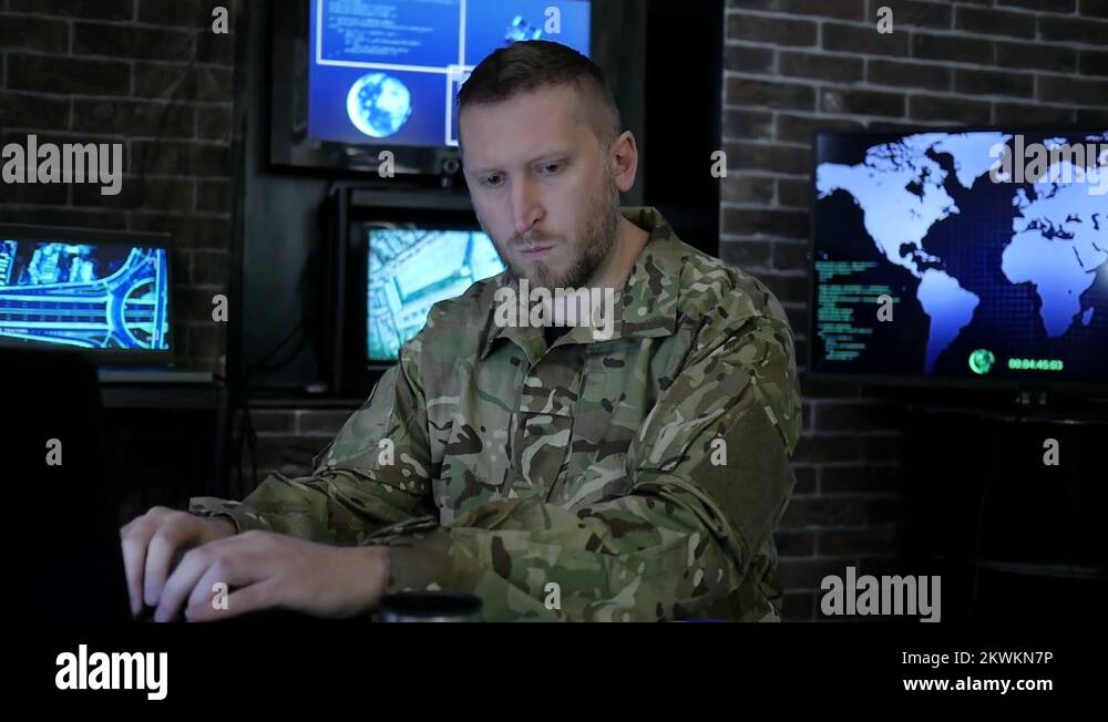 portrait commander male in shape, in monitoring room, military control ...