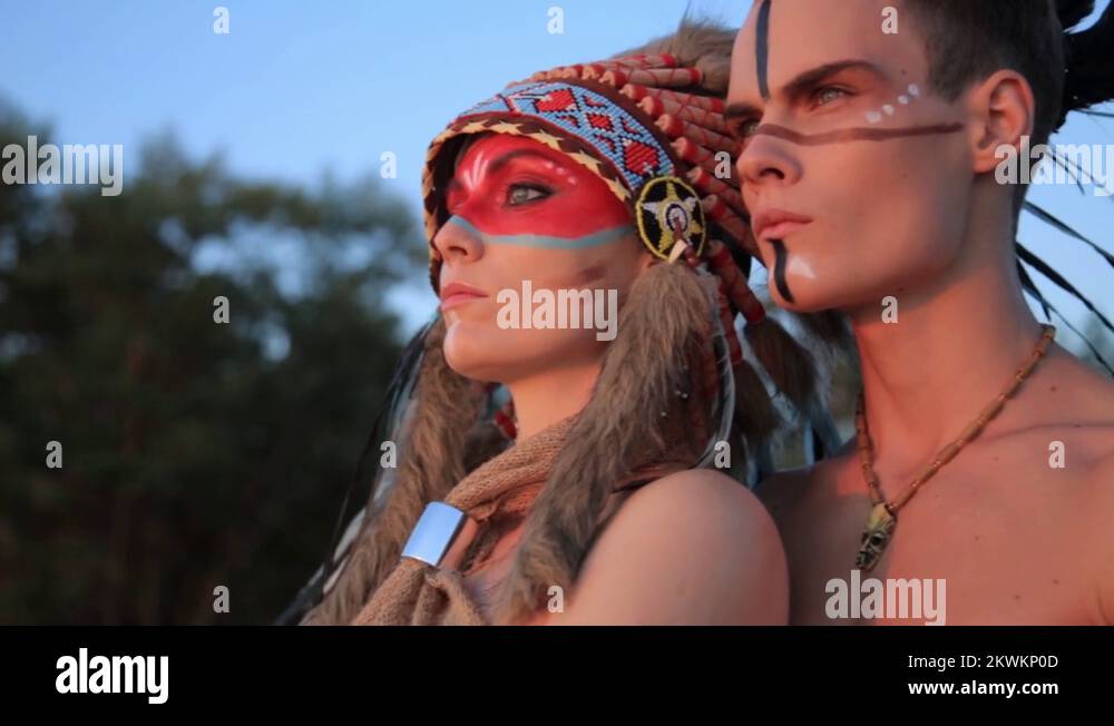 Beautiful native american Indian man and woman in traditional dress at ...