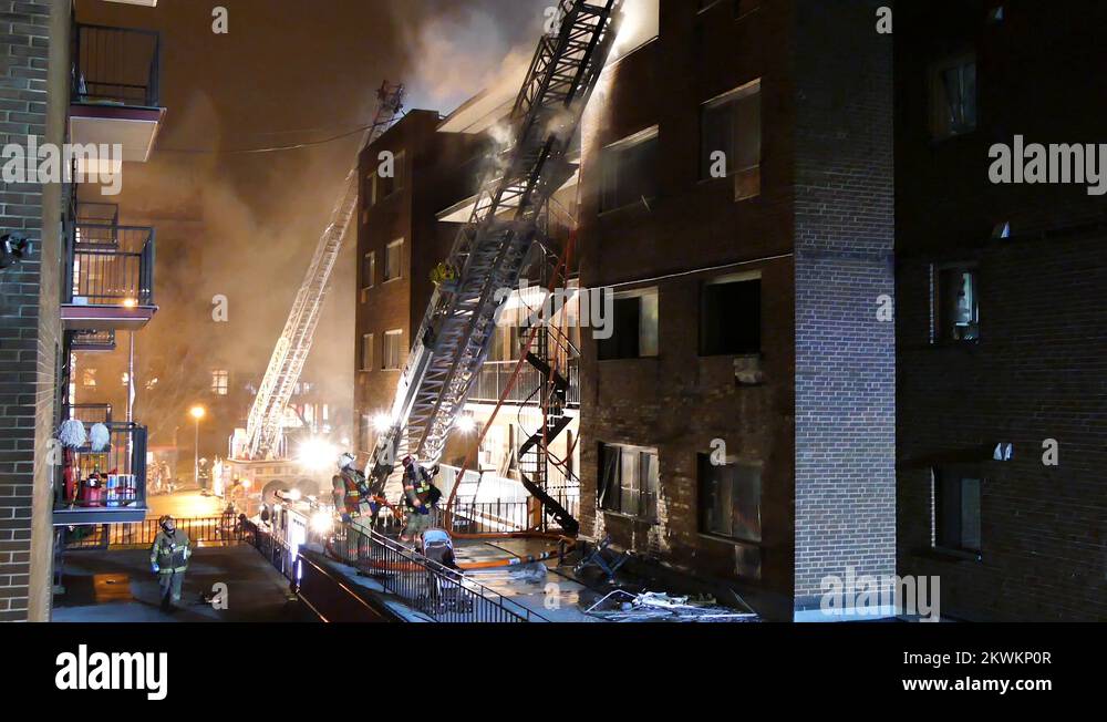 Scene of fire attack with smoke and dual ladders deployment Stock Video ...