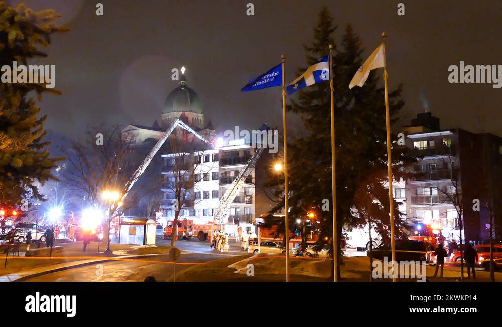 Fire department on scene of building fire with oratory in background ...