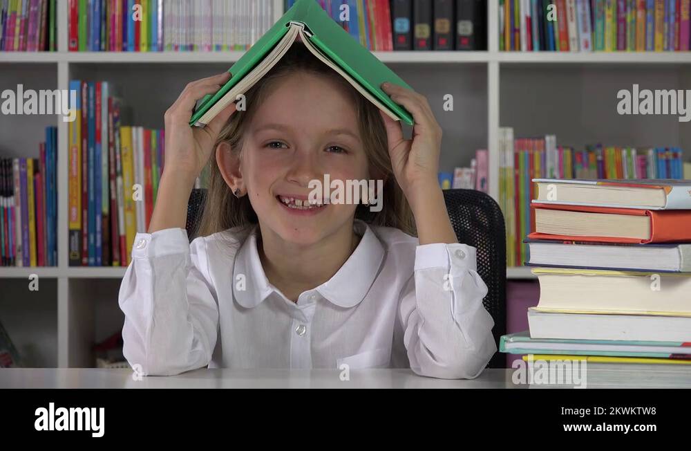Student Child Laughing in Library, School Girl Smiling at Camera ...