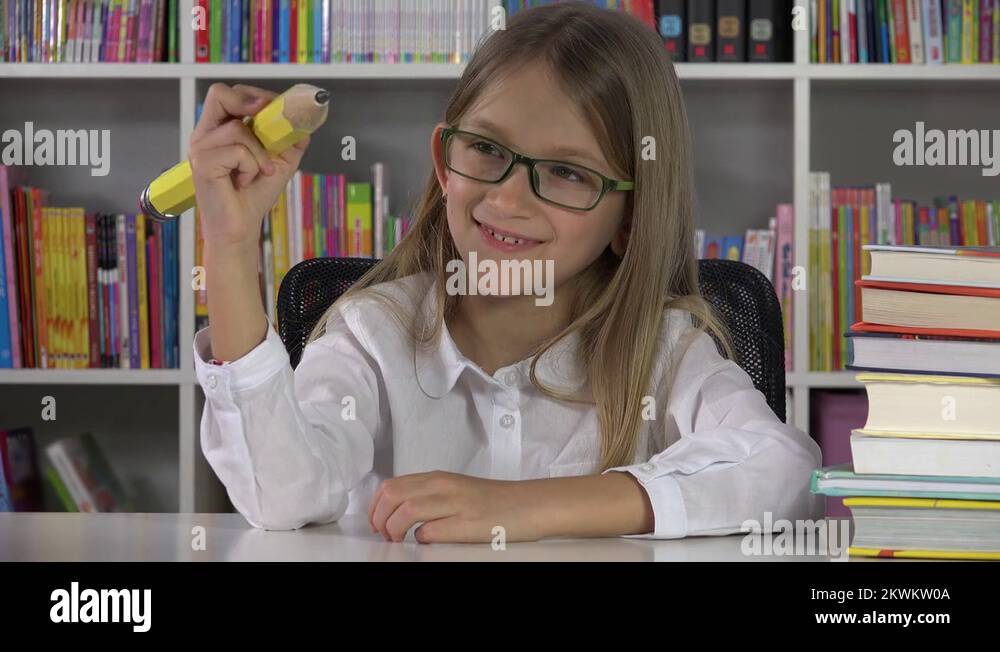 Student Child Writing Studying in Library Learning School Girl at Desk ...