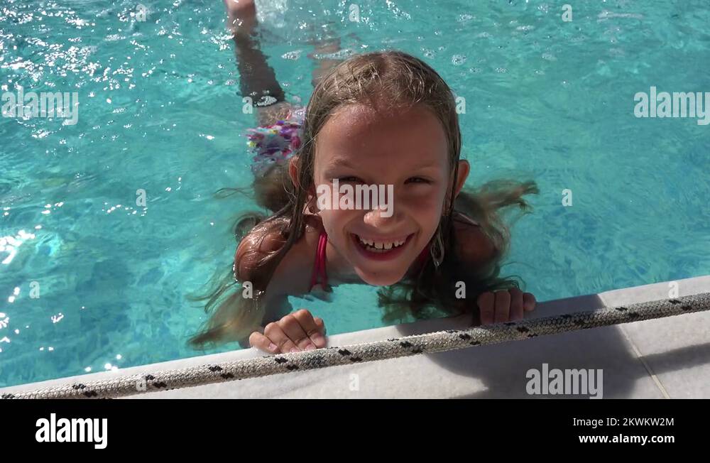 Child Portrait Splashing Water in Swimming Pool, Smiling Girl Face ...