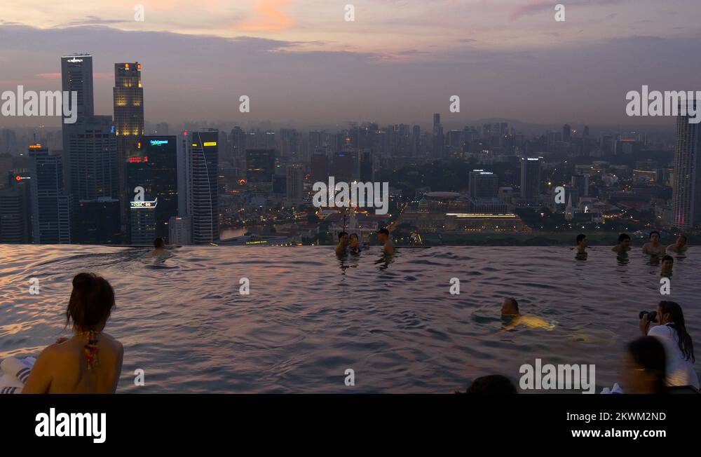 sunset famous hotel rooftop swimming pool tourist panorama 4k singapore ...