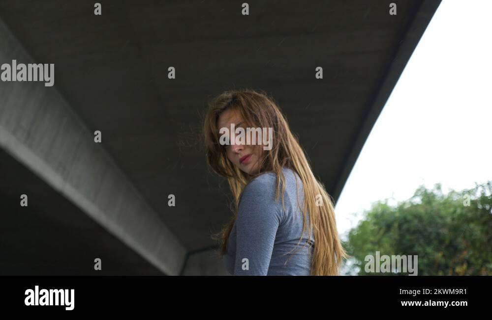 Looking back woman Stock Videos & Footage - HD and 4K Video Clips - Alamy