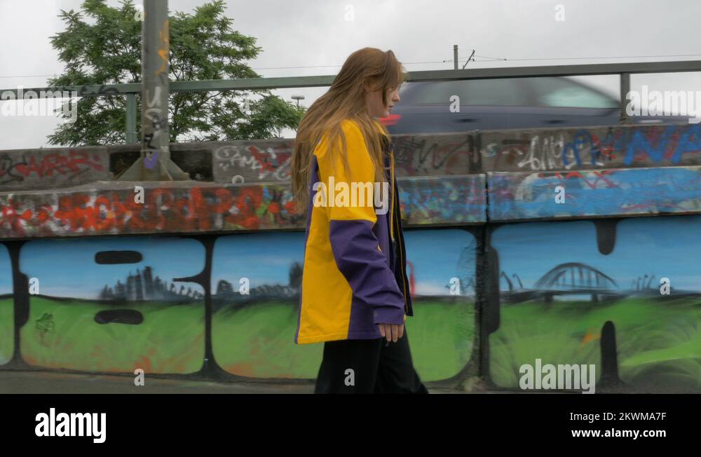 Taking off and Tossing the Rain Coat Stock Video Footage - Alamy