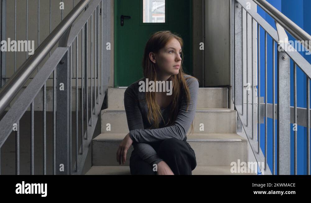 Staircase girl sitting Stock Videos & Footage - HD and 4K Video Clips ...