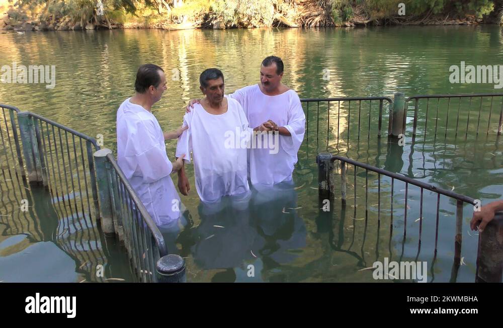 Baptism of pilgrims in the Jordan River Holy Land Israel Stock Video ...