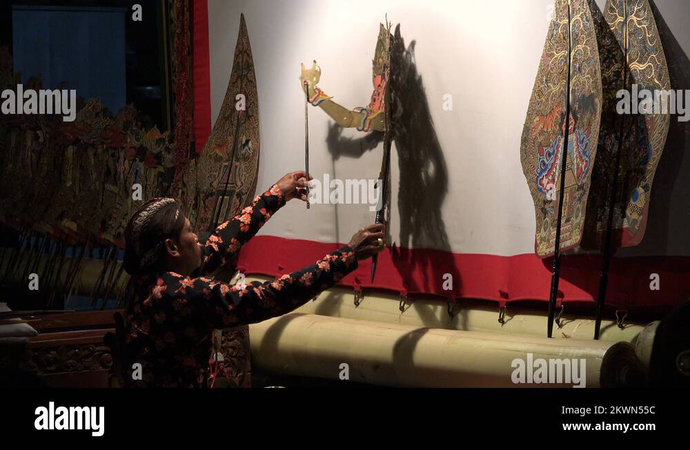 Backstage view shadow puppet master traditional Wayang Kulit show in ...