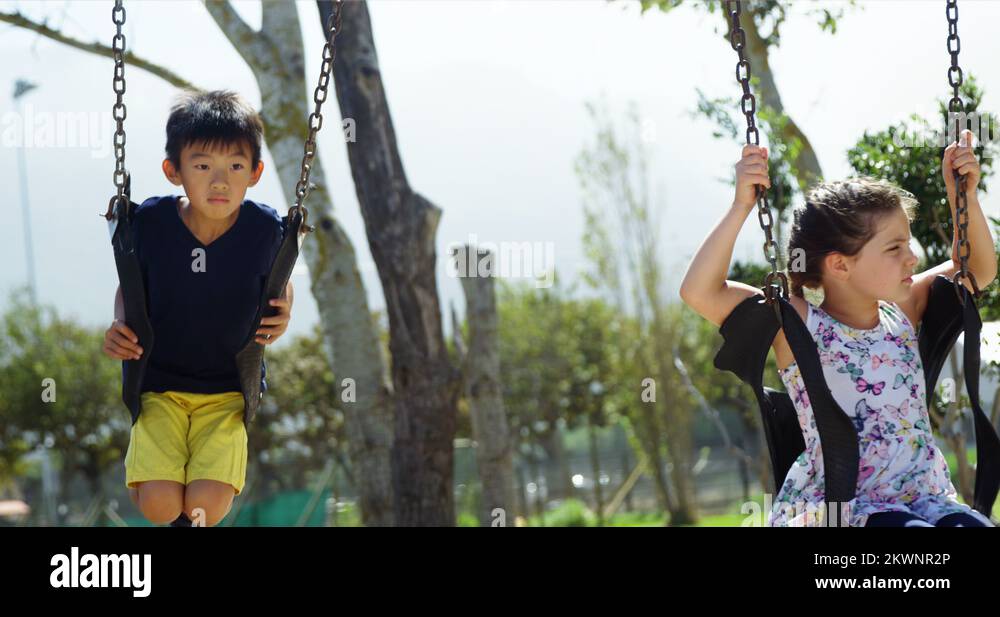 Schoolkids playing in playground Stock Video Footage - Alamy