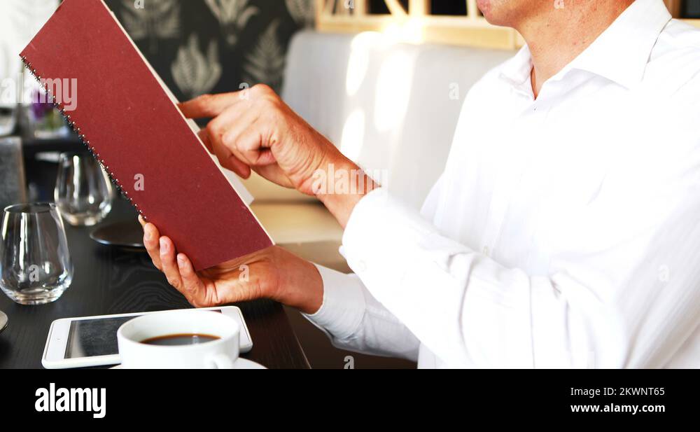 Checking the menu Stock Videos & Footage - HD and 4K Video Clips - Alamy