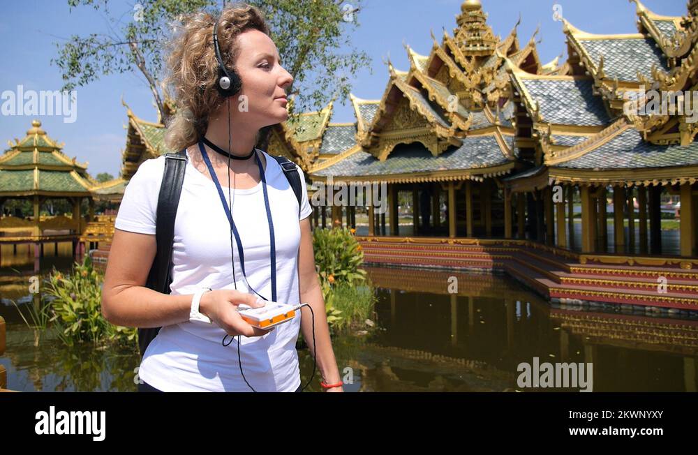 Tourist listening audio guide Stock Videos & Footage - HD and 4K Video ...