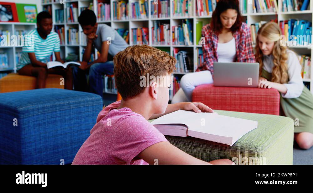 Teenager reading to kids library Stock Videos & Footage - HD and 4K ...