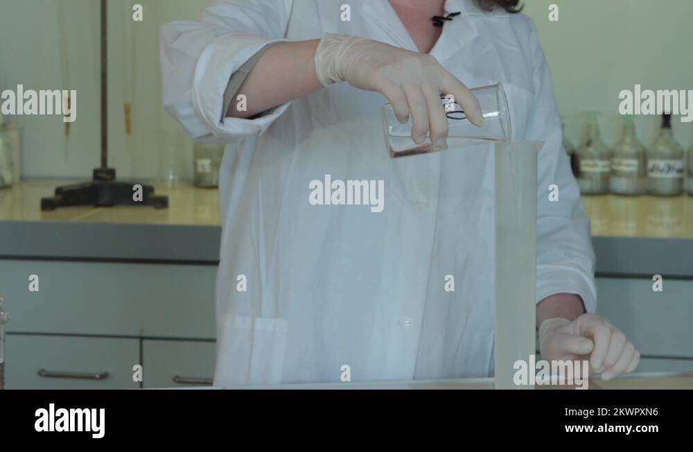Pouring chemicals in a laboratory Stock Videos & Footage - HD and 4K ...