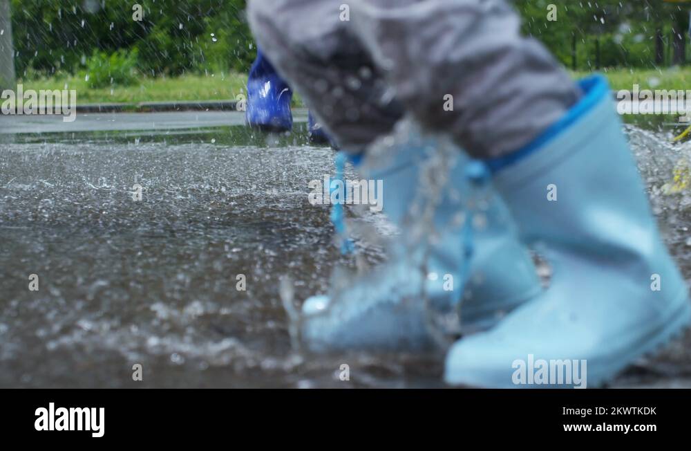 Children playing puddle Stock Videos & Footage - HD and 4K Video Clips ...