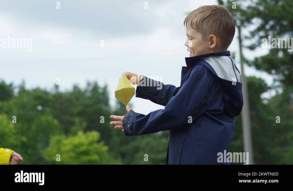 Kids playing paper boats Stock Videos & Footage - HD and 4K Video Clips ...