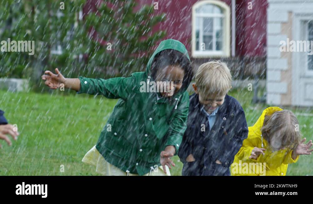 Children playing running rain Stock Videos & Footage - HD and 4K Video ...
