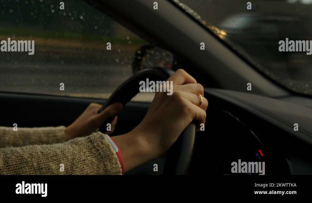 Woman Hands On Steering Wheel Of A Car In Rainy Weather Stock Video ...