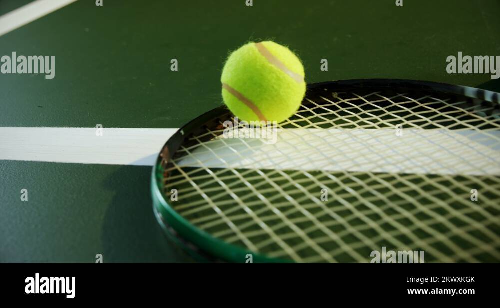 Racket and tennis ball in court 4k Stock Video Footage - Alamy