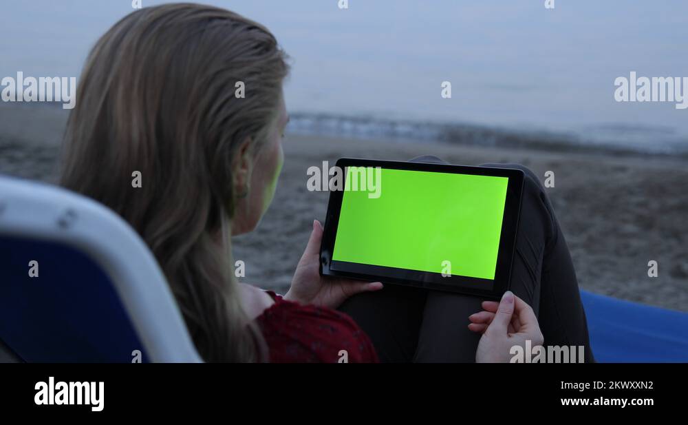 Woman Relaxing on Sunbed Watch Digital Tablet with Green Screen Sea ...