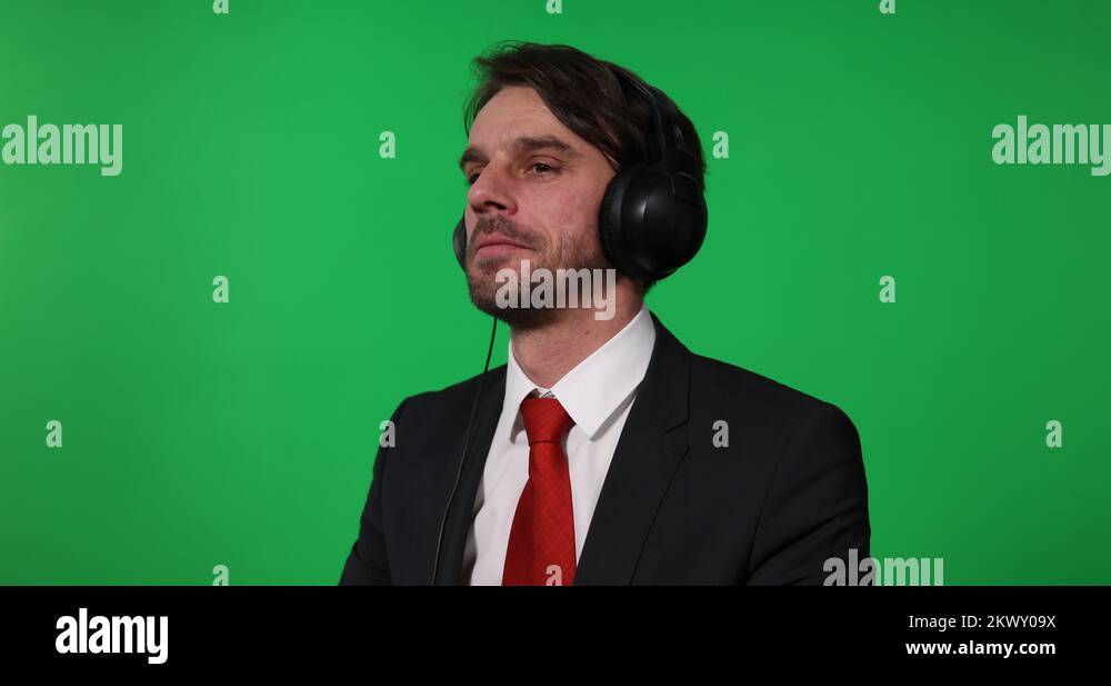 Relaxed Ceo Business Man Listening Music on Headphones Green Screen ...