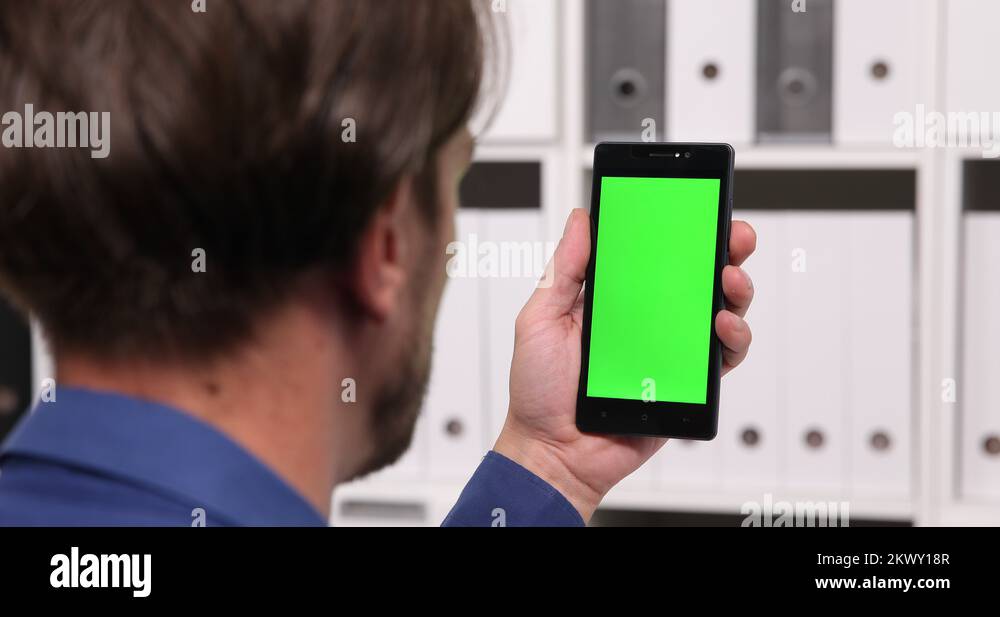 Business Man Browse Mobile Phone with Green Screen Scrolling Typing ...
