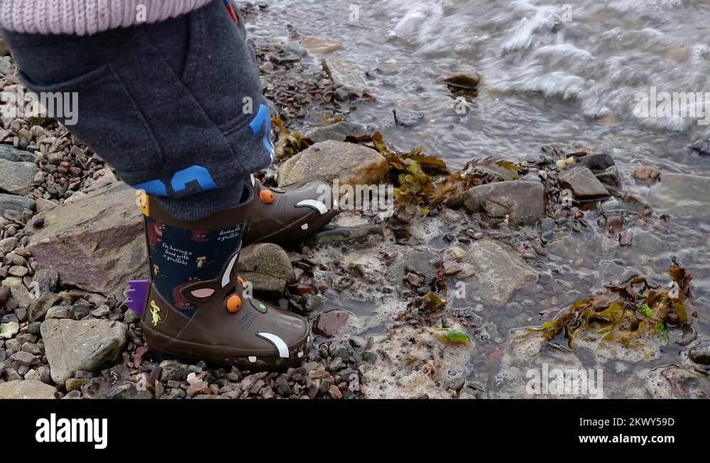 Boy with wellies Stock Videos & Footage - HD and 4K Video Clips - Alamy