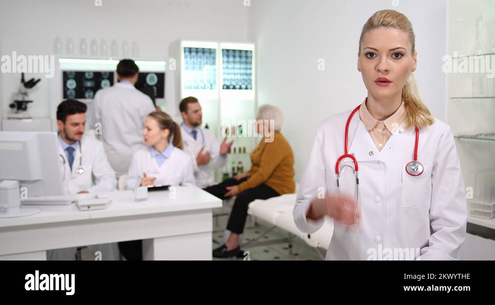 Successful Hospital Medic Woman Answer Question Looking Camera Teamwork ...