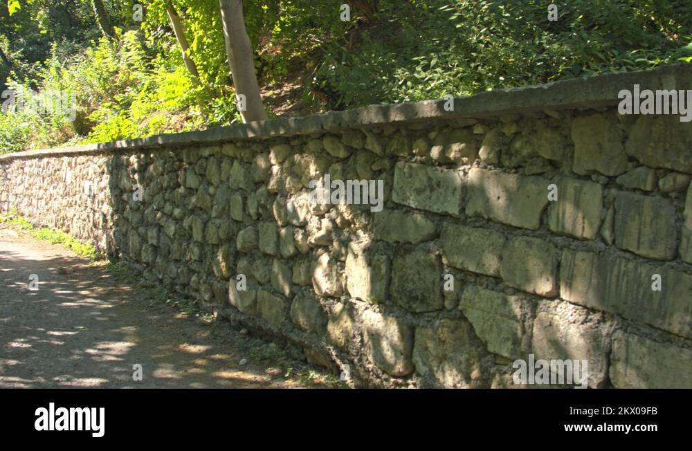 Stone wall along road Stock Videos & Footage - HD and 4K Video Clips ...