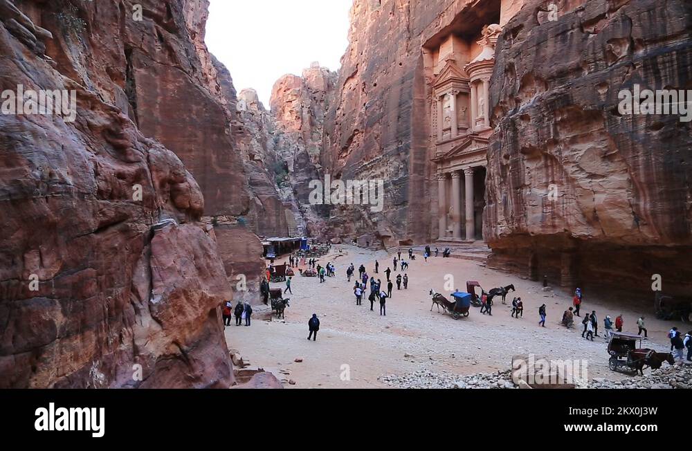 People near Al Khazneh or the Treasury at ancient Rose City of Petra in ...